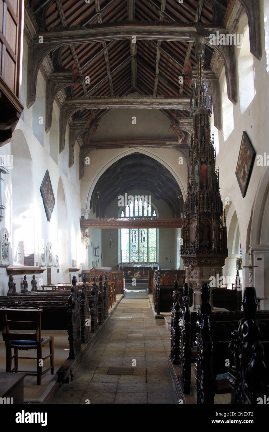 The nave of Ufford church with the famous 15th century font cover on ...