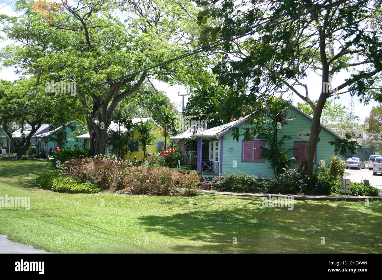 A typical wooden house in Barbados, painted in bright colours Stock ...