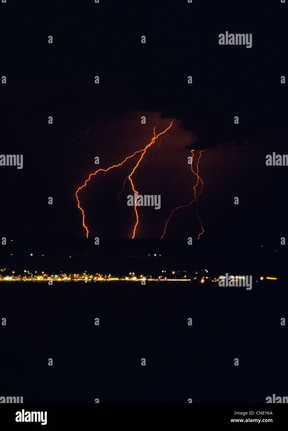 Lightning strike at nighttime West Seattle Elliott Bay Stock Photo - Alamy