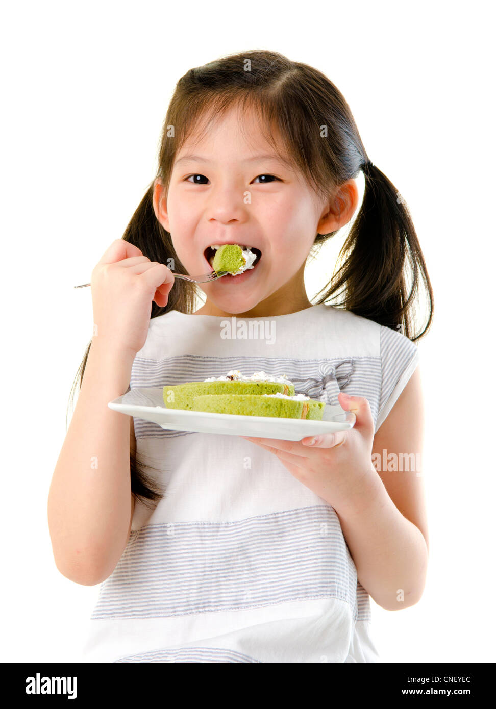 Asian girl eating cakes Stock Photo - Alamy