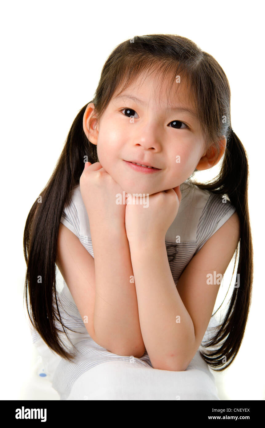 Young Asian girl with smile on her face Stock Photo - Alamy