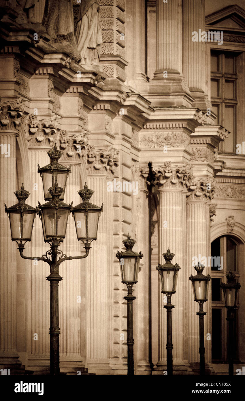 Lamp posts and columns at the Louvre Palace, Louvre Museum, Paris ...
