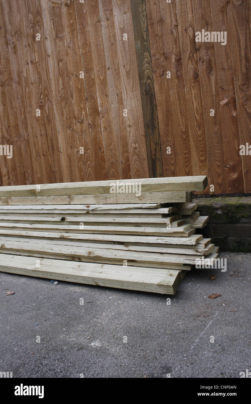 new fence being erected at local pub. Worksop, Notts, England Stock ...