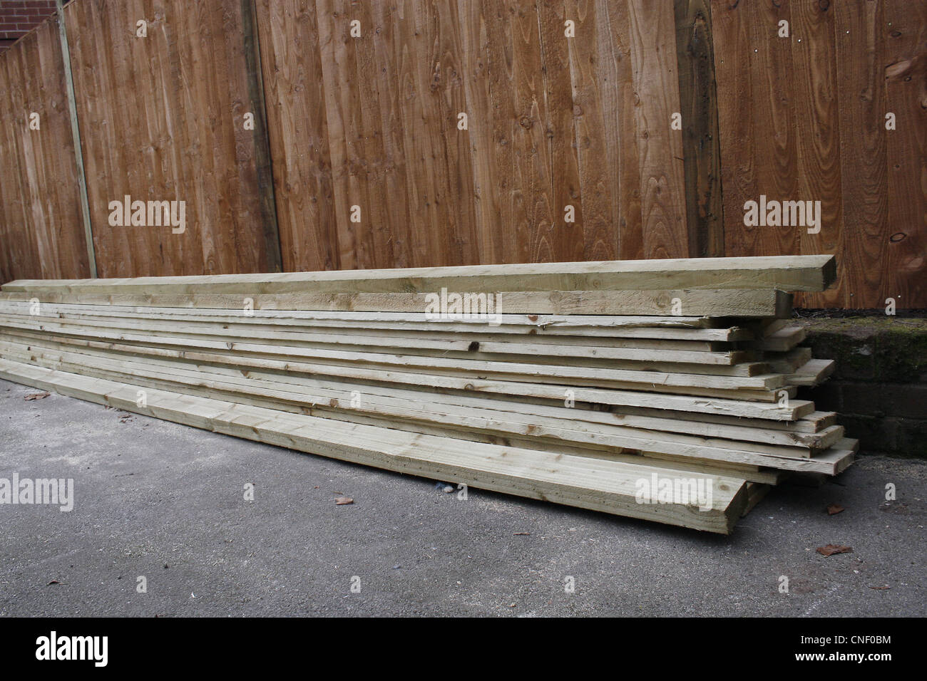 new fence being erected at local pub. Worksop, Notts, England Stock ...