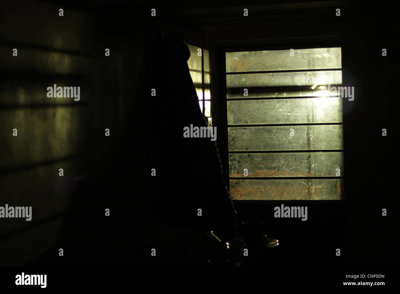 Light through a window in a dark room Stock Photo - Alamy