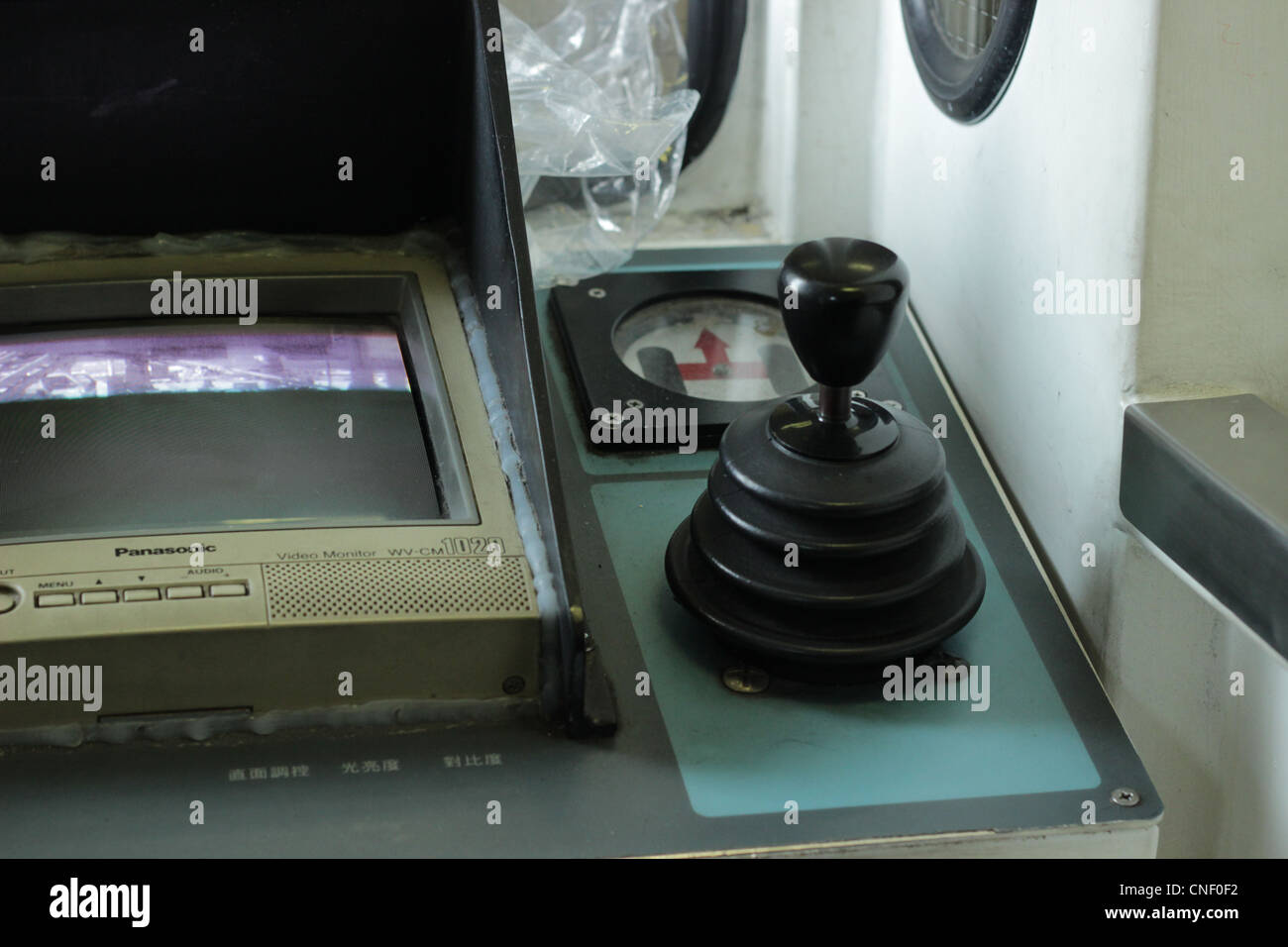 Airplane bridge controller while boarding the plane Stock Photo - Alamy