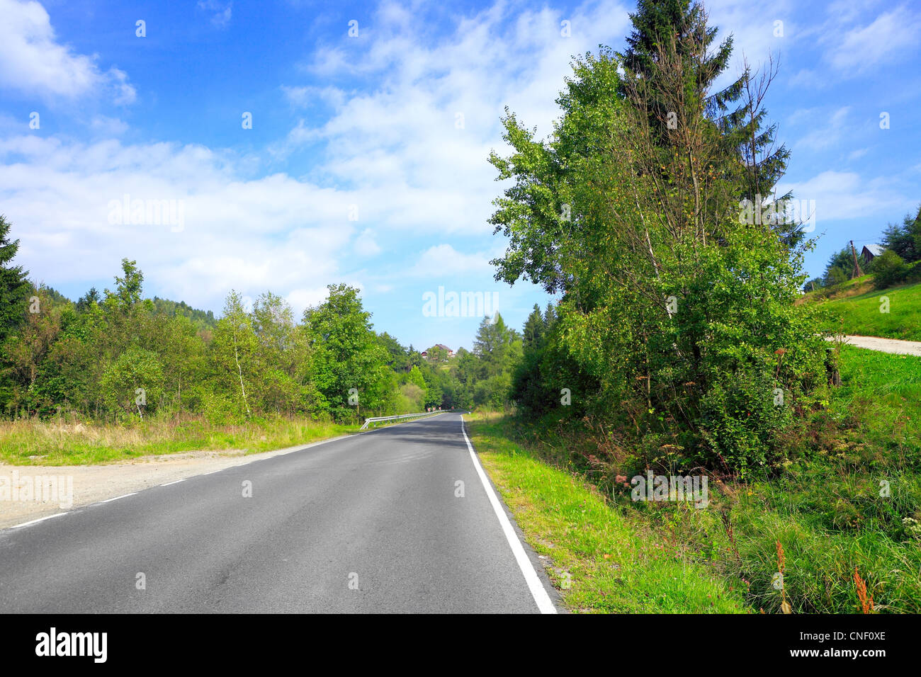 Empty country road Stock Photo - Alamy
