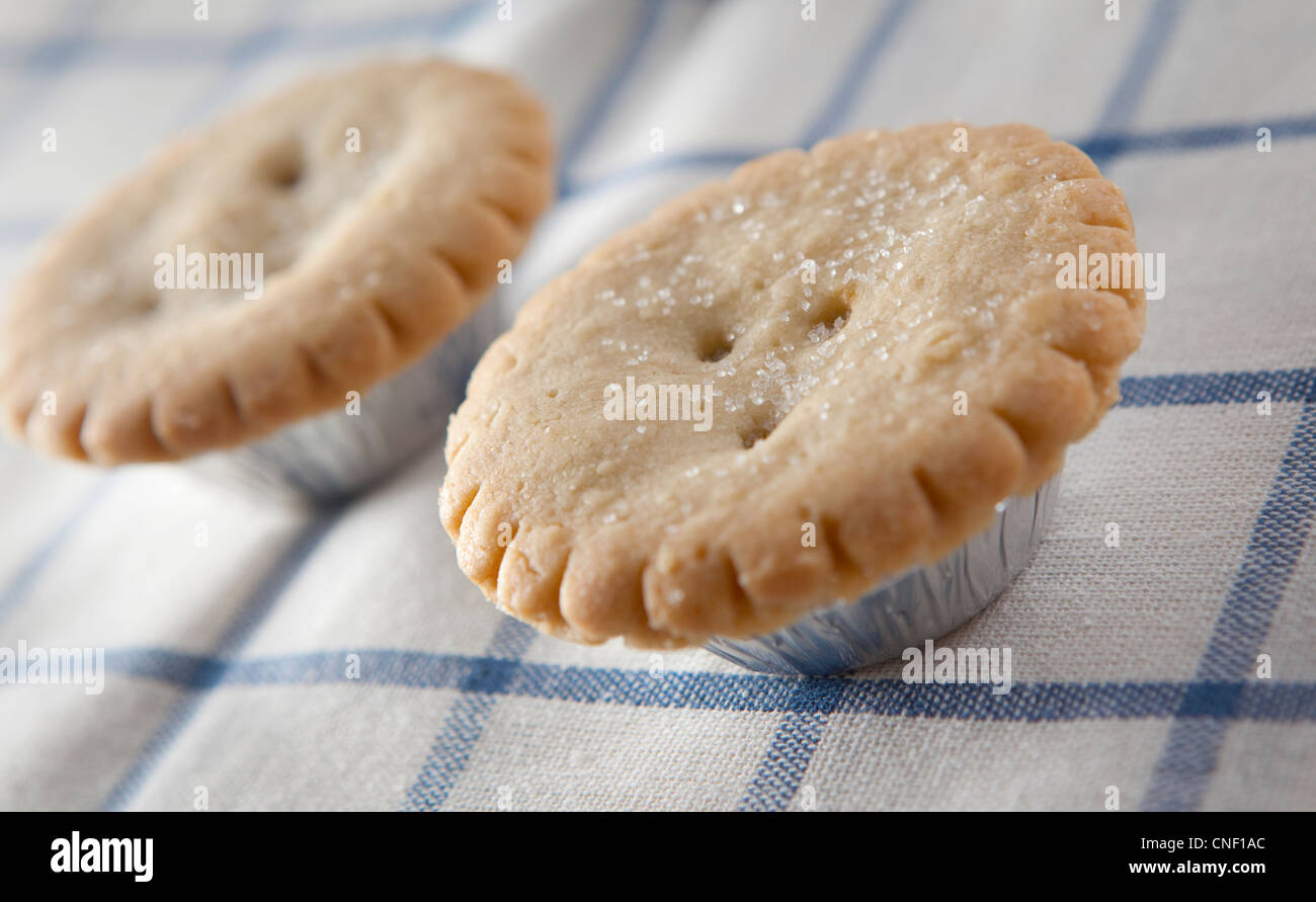 Sweet tarts on the checked textile background Stock Photo - Alamy
