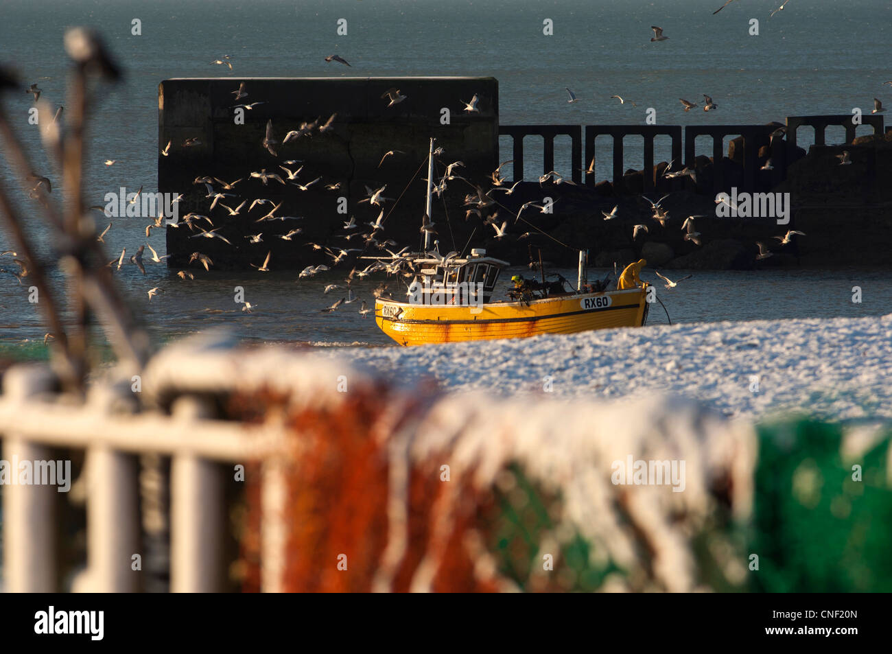 Hastings fishermen landing their catch at The Stade. Old Town harbour ...