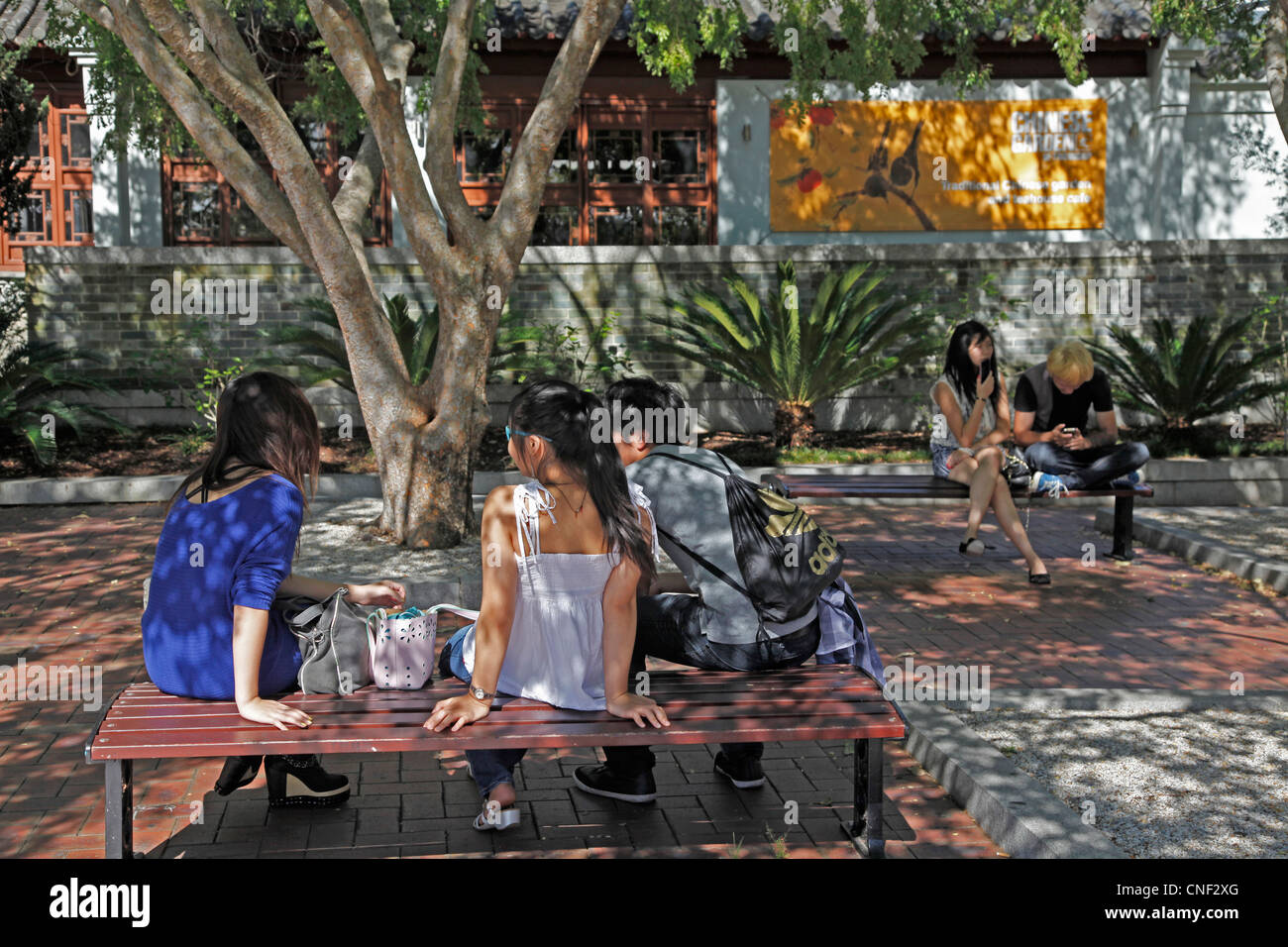 Chinese tourists outside the Chinese Garden of Friendship in Chinatown ...