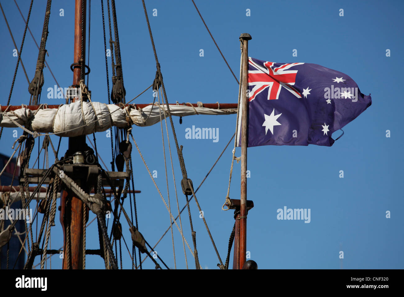Ols ship and Australian flag in the Harbour area and the Rocks in ...