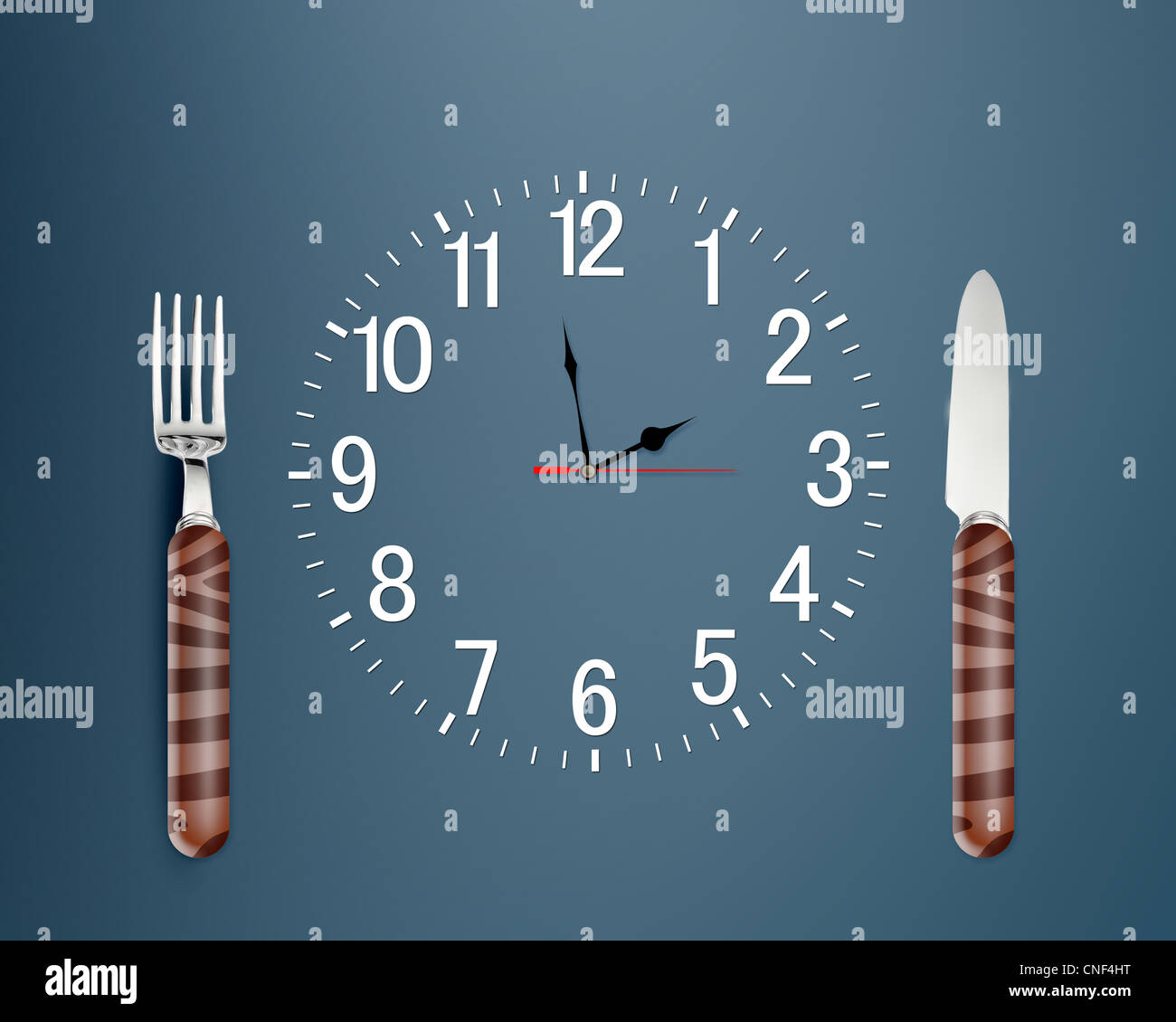 Lunch time concept, Clock in plate, knife and fork Stock Photo - Alamy