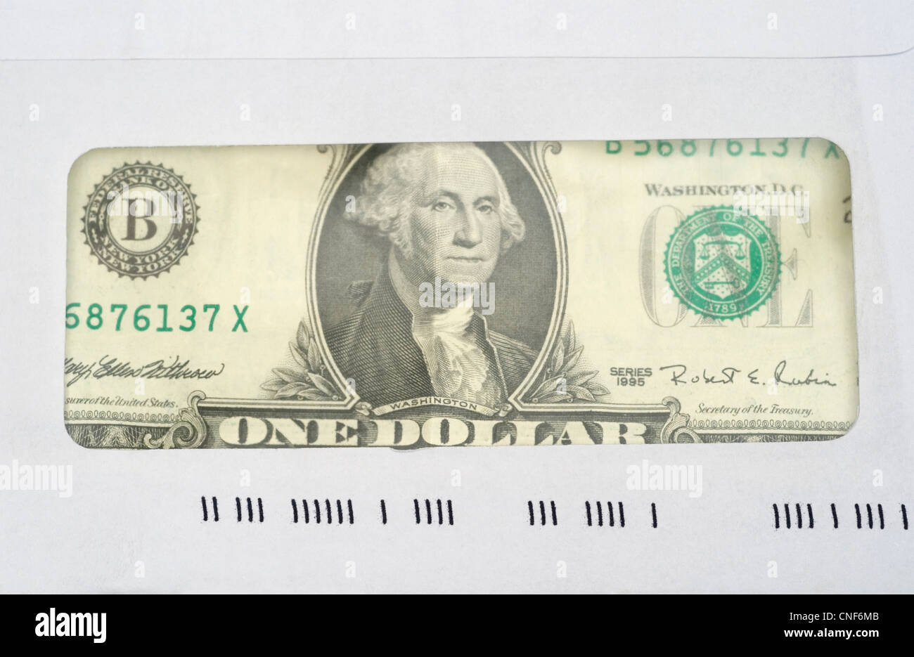 dollar behind envelope address window Stock Photo - Alamy