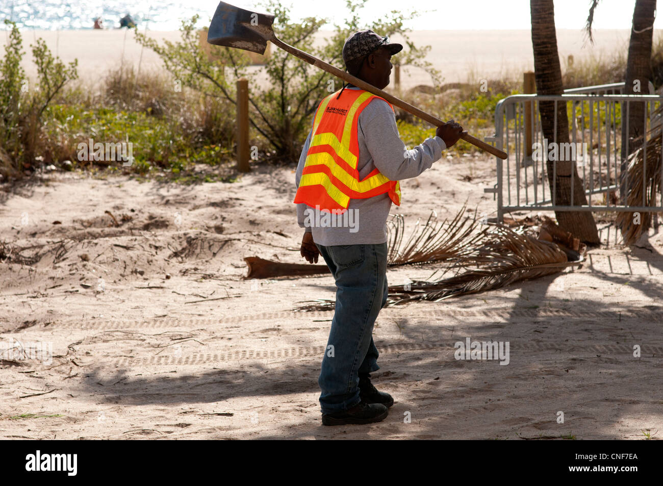 Worker with shovel Stock Photo - Alamy