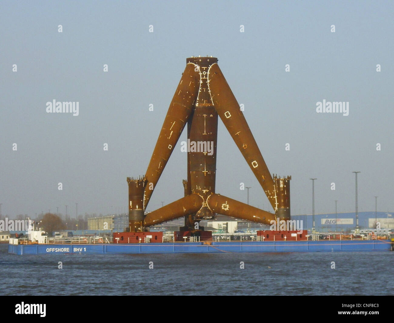 A tripod structure is being prepared for the installation of an ...