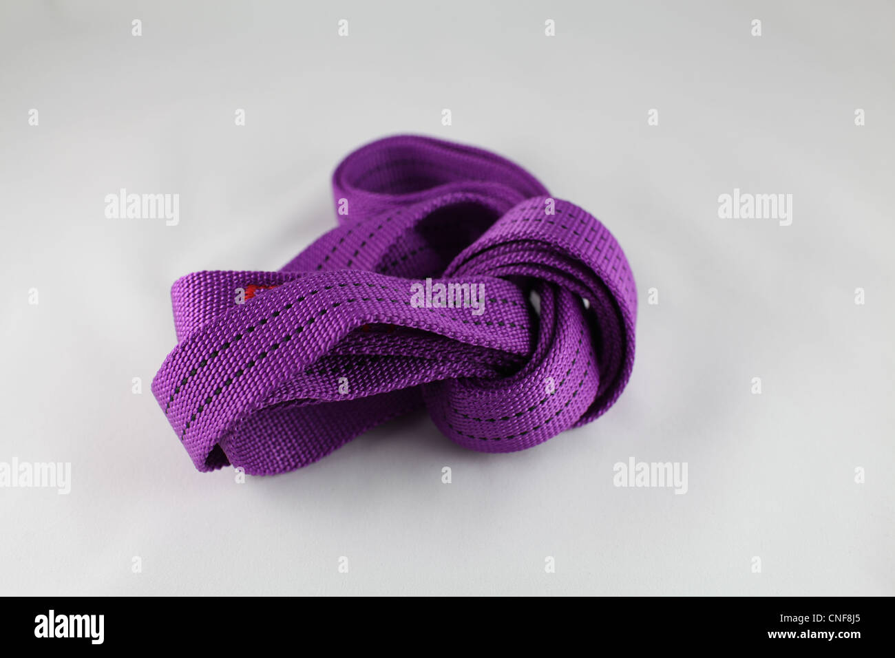 Purple climbing sling Stock Photo - Alamy