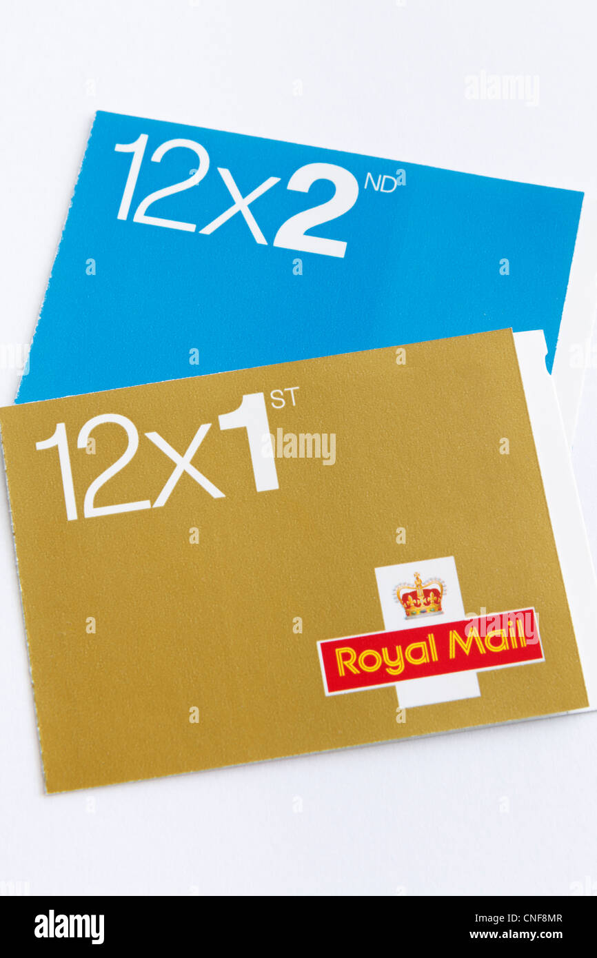 UK, Britain. Books of Royal Mail first and second class postage stamps ...