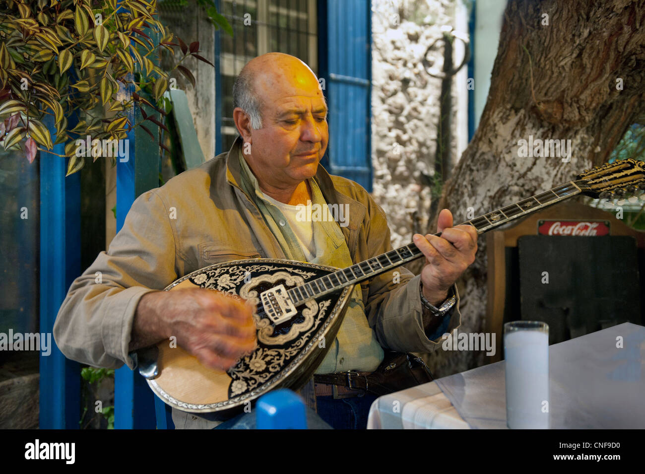 Greek player in Mytilini harbor Lesbos Greece Stock Photo - Alamy