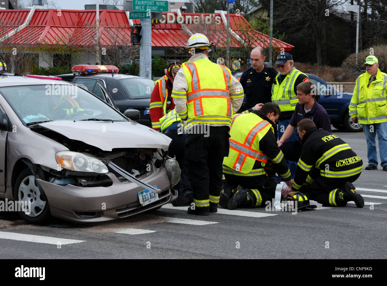 Auto crash at intersection attended by first responders Stock Photo - Alamy