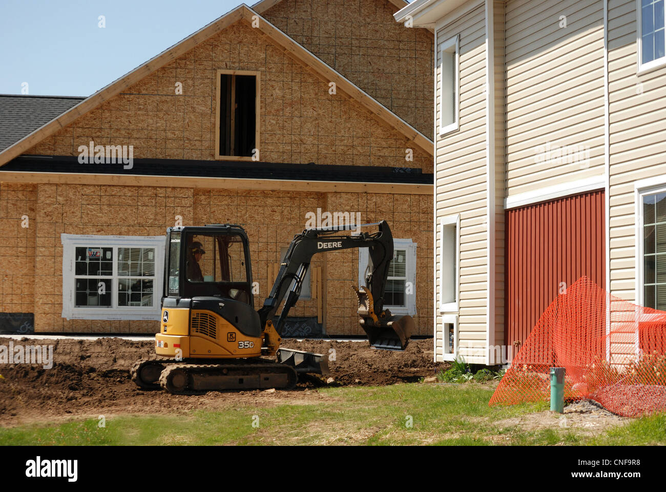 Backhoe grading hi-res stock photography and images - Alamy