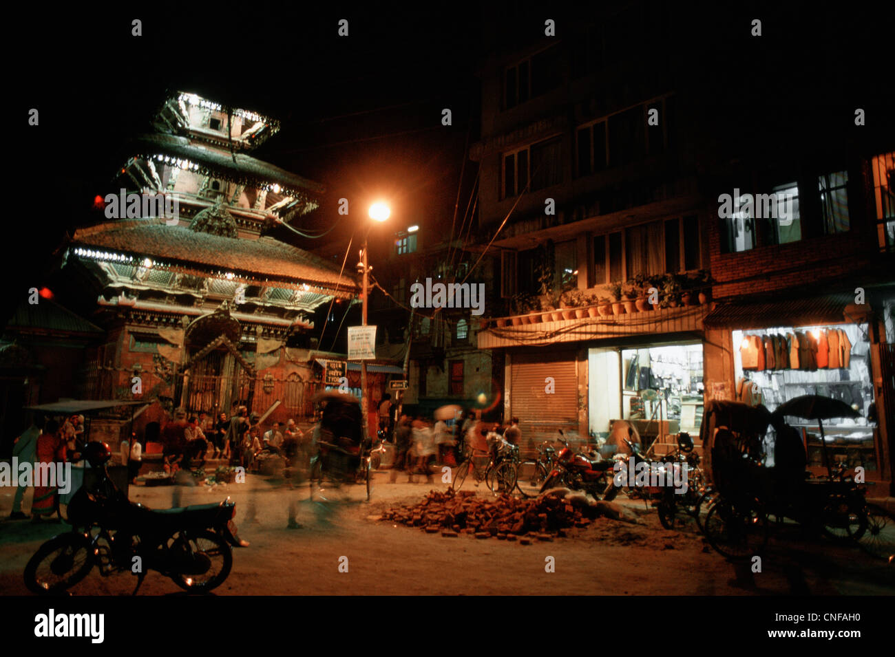 A hindu temple and shops at night ( Nepal Stock Photo - Alamy