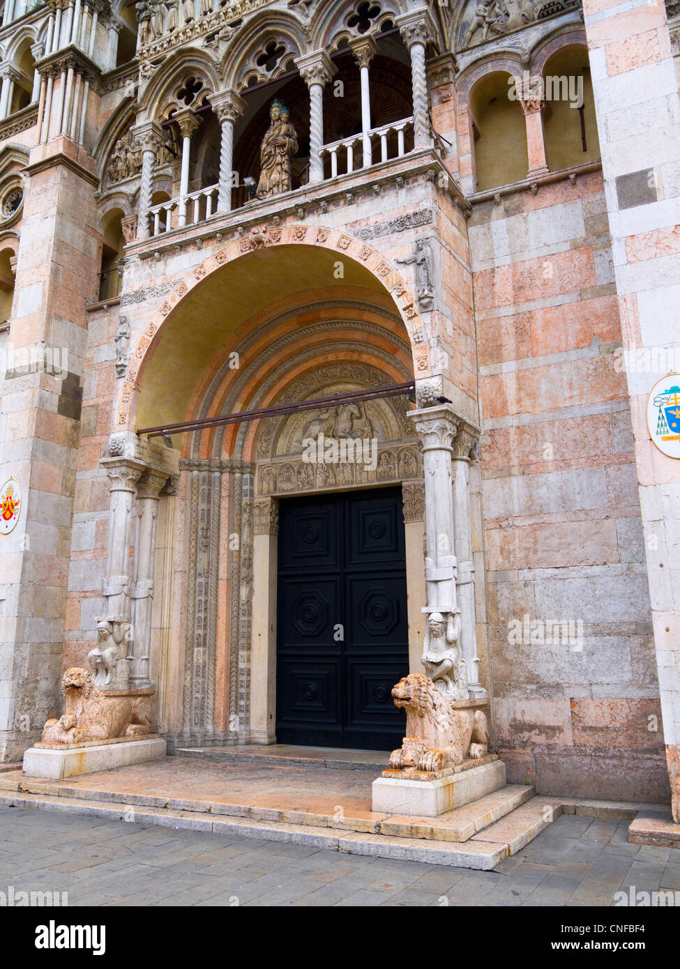 The facade of the Duomo in the beautiful city of Ferrara in the ...