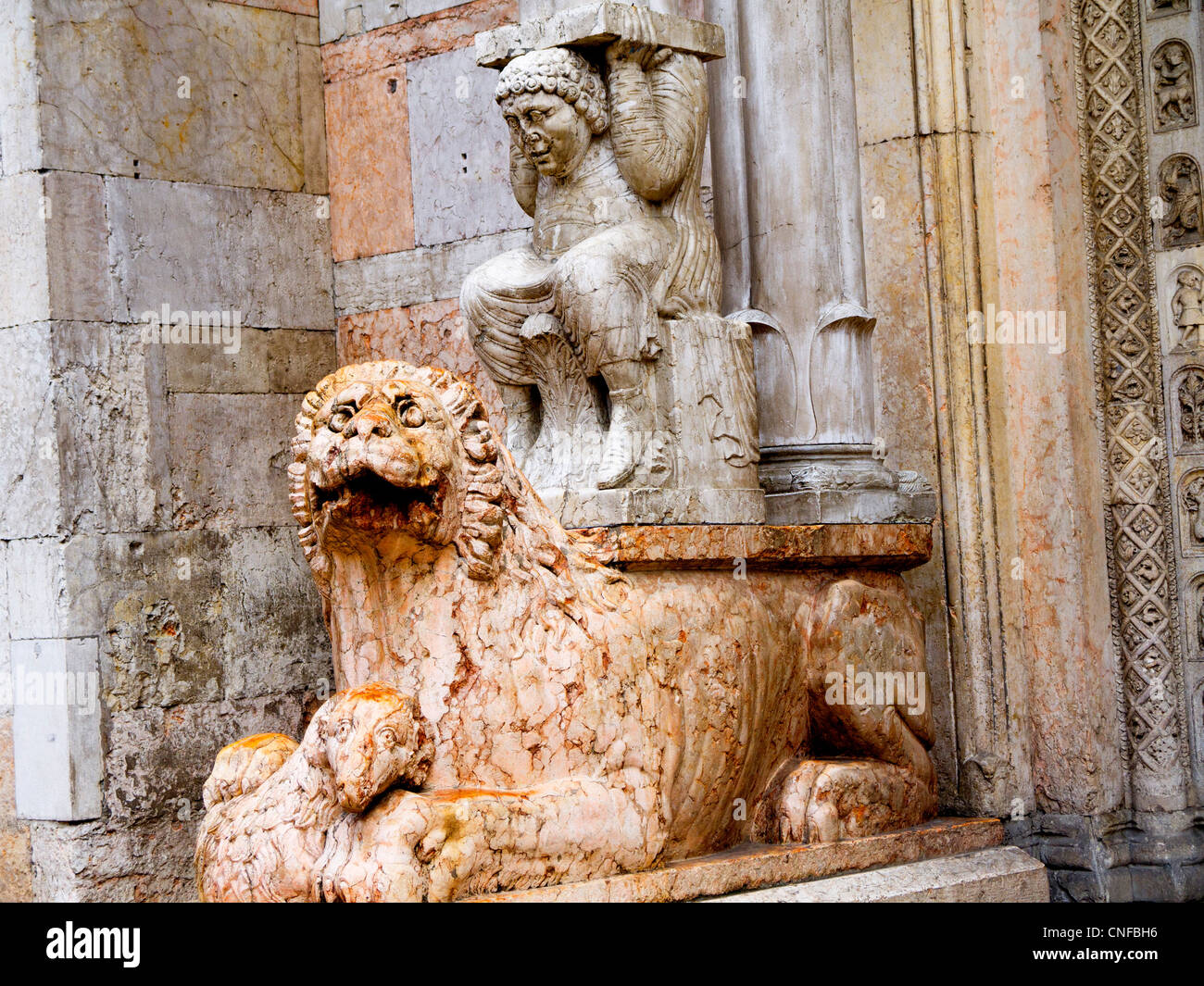 The facade of the Duomo in the beautiful city of Ferrara in the ...