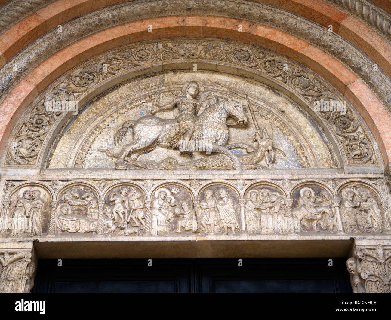 The facade of the Duomo in the beautiful city of Ferrara in the ...