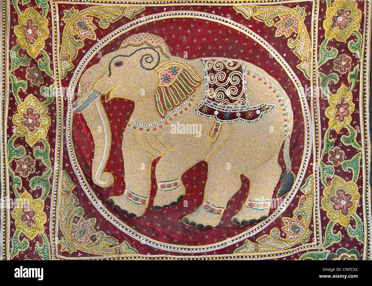 Sequined and embroidered textiles called kalaga were traditionally used ...