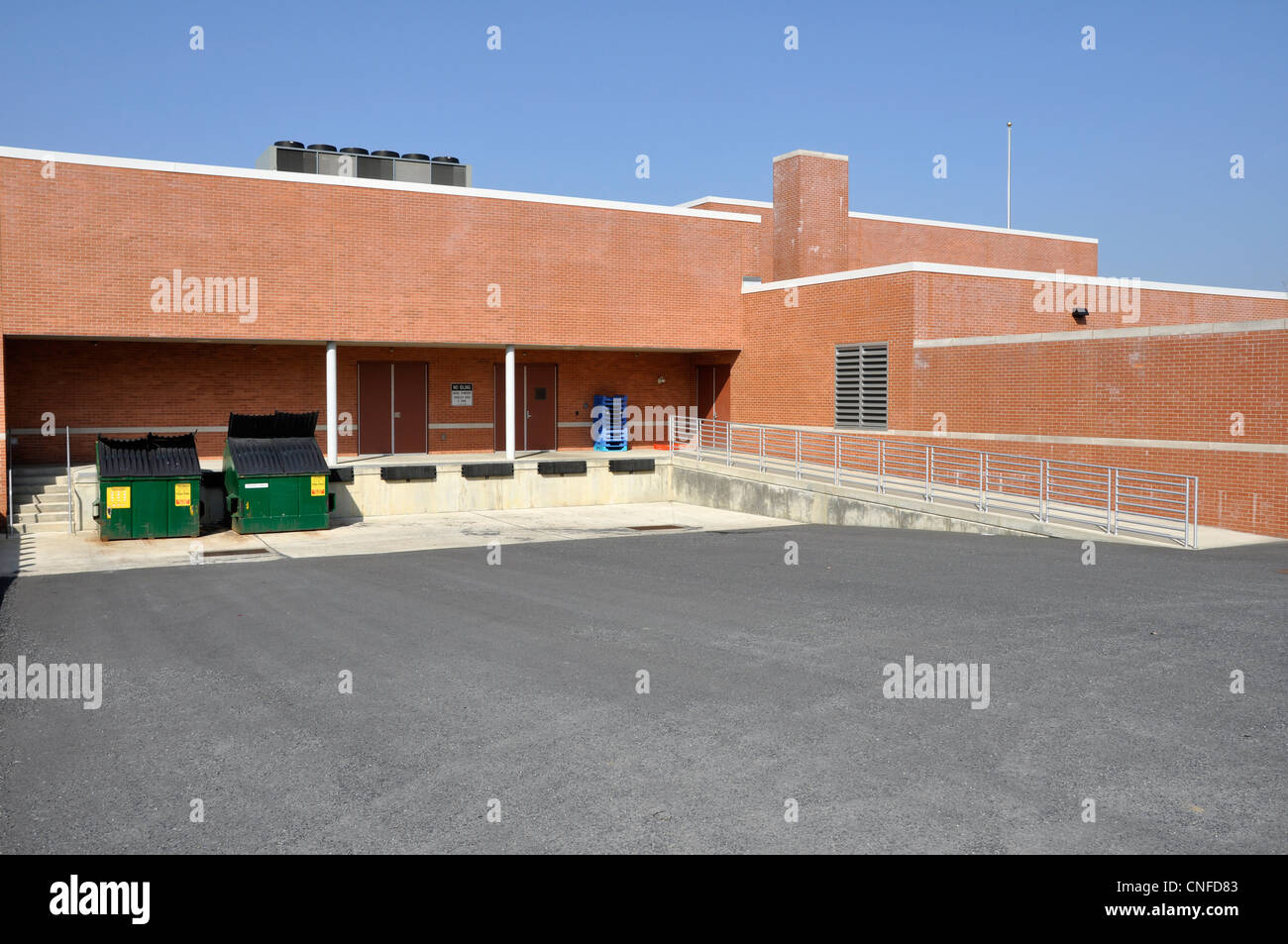 unloading docks for a red brick school Stock Photo - Alamy