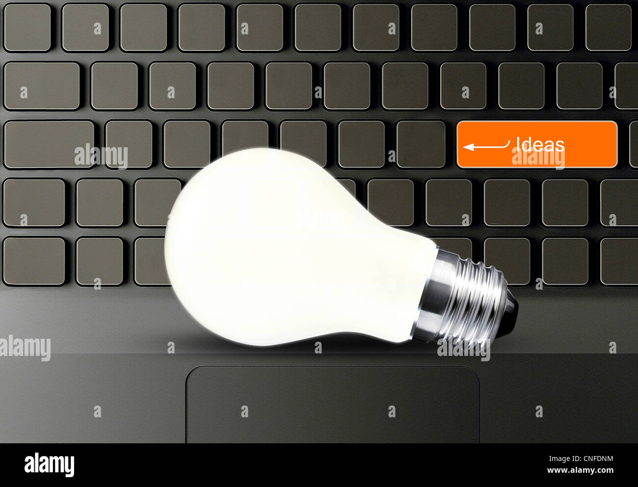 Keyboard with Ideas button and light bulb Stock Photo - Alamy