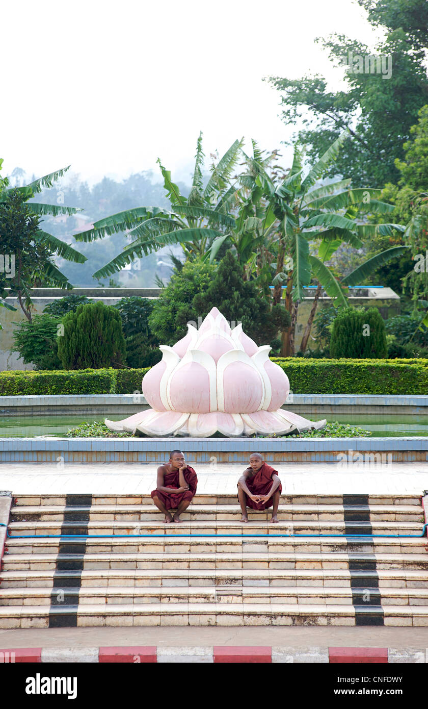 Two monks sitting on steps together, Pyin Oo Lwin, Near Mandalay, Burma ...