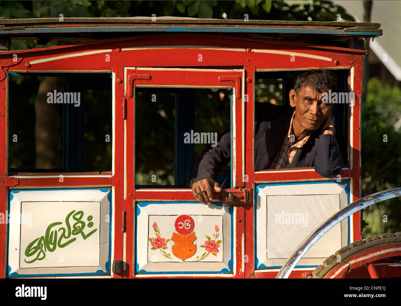 Burmese driver of local horsedrawn transport distinctive to Pyin U Lwin ...