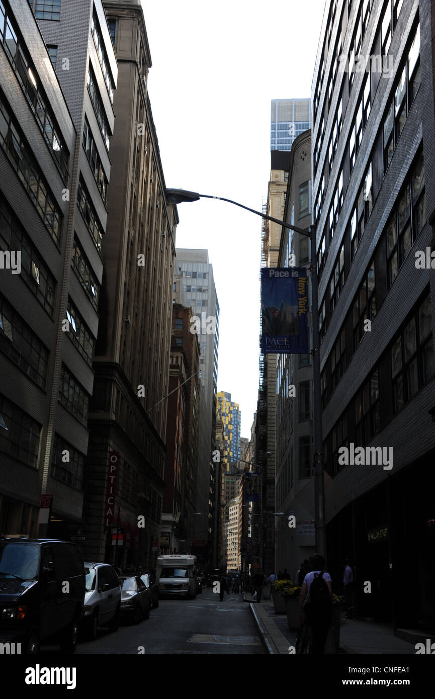 Dark shade 'urban alley' portrait parked cars, lamp-posts, multi-storey ...