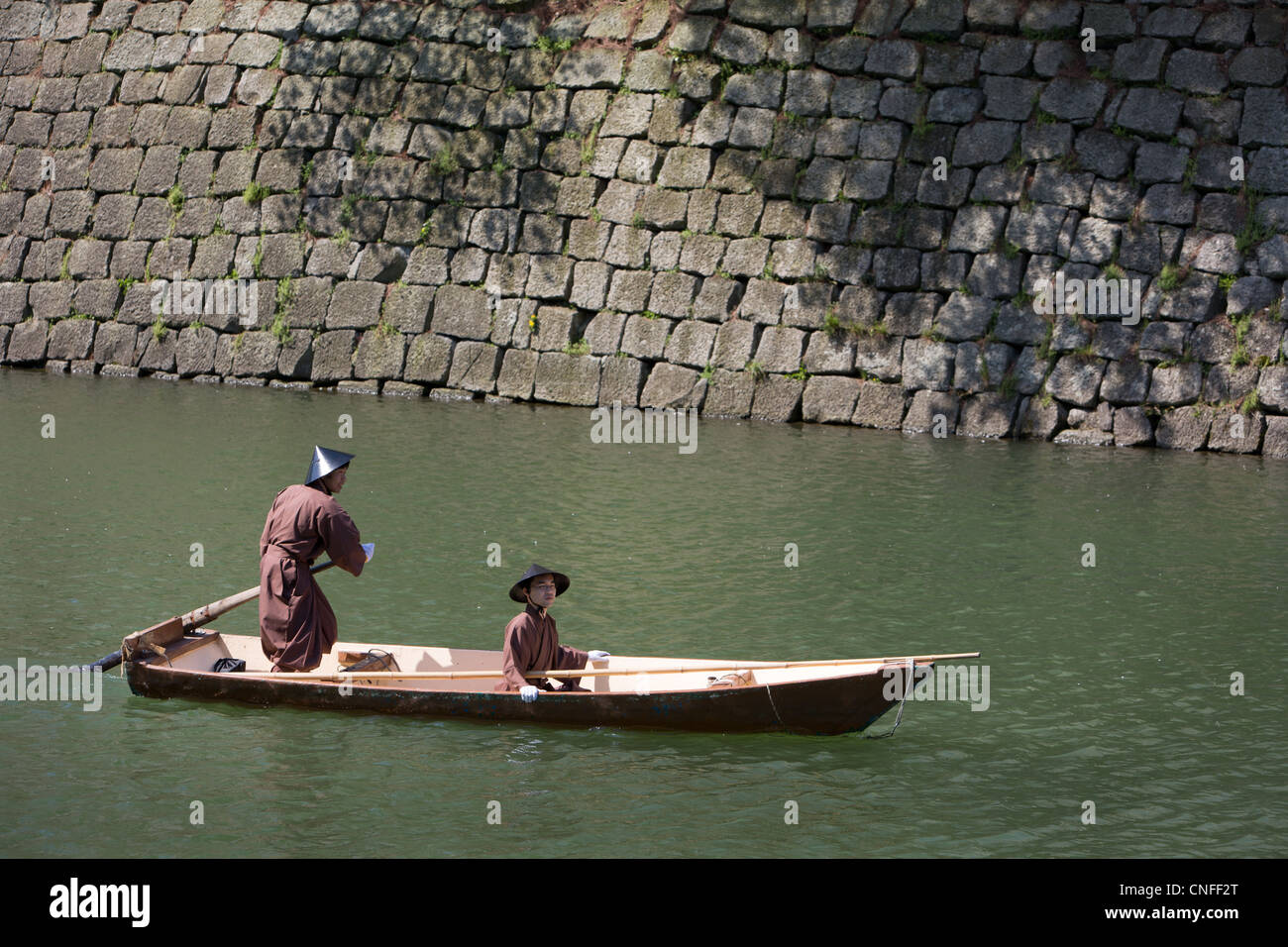 Fukui Castle, moat, fortified stone wall and cherry blossom, in Fukui ...