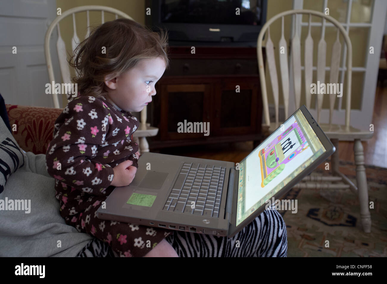 Child with computer Stock Photo - Alamy