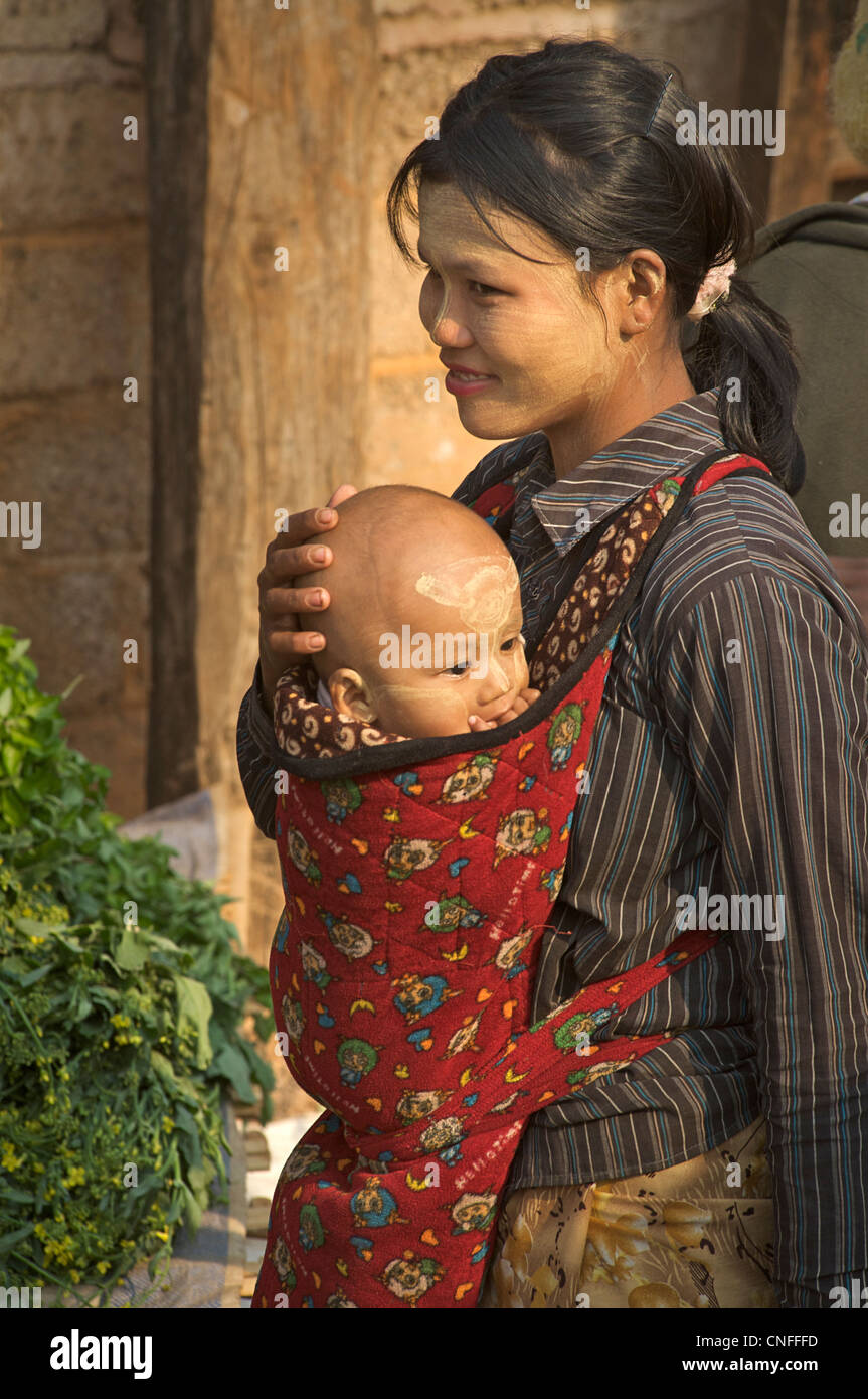 Burmese mother carrying baby, Naung Mon market, Lashio, Burma. Myanmar ...