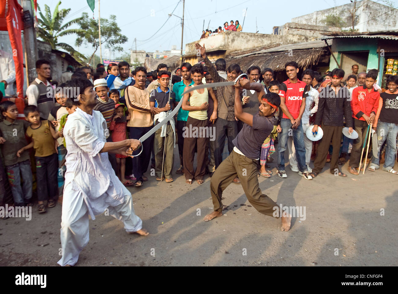 Men fighting during the annual Muslim festival of Muharram in Khulna ...