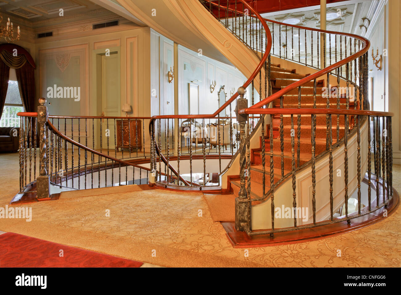 Hallway at the Bosphorus Palace with elegant spiral staircase leading ...