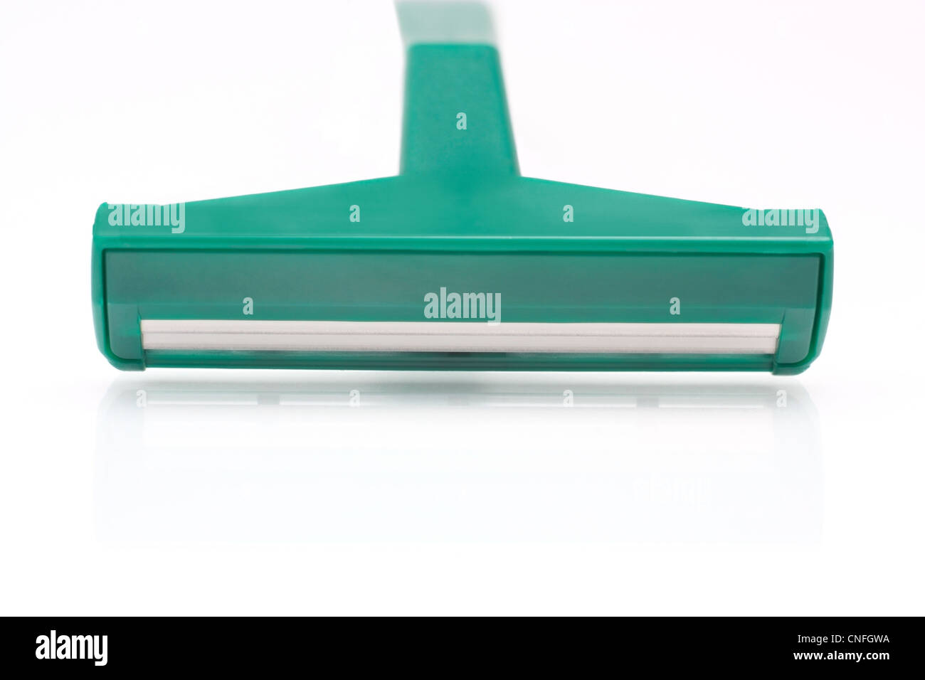 Green manual shaving on a white background Stock Photo - Alamy