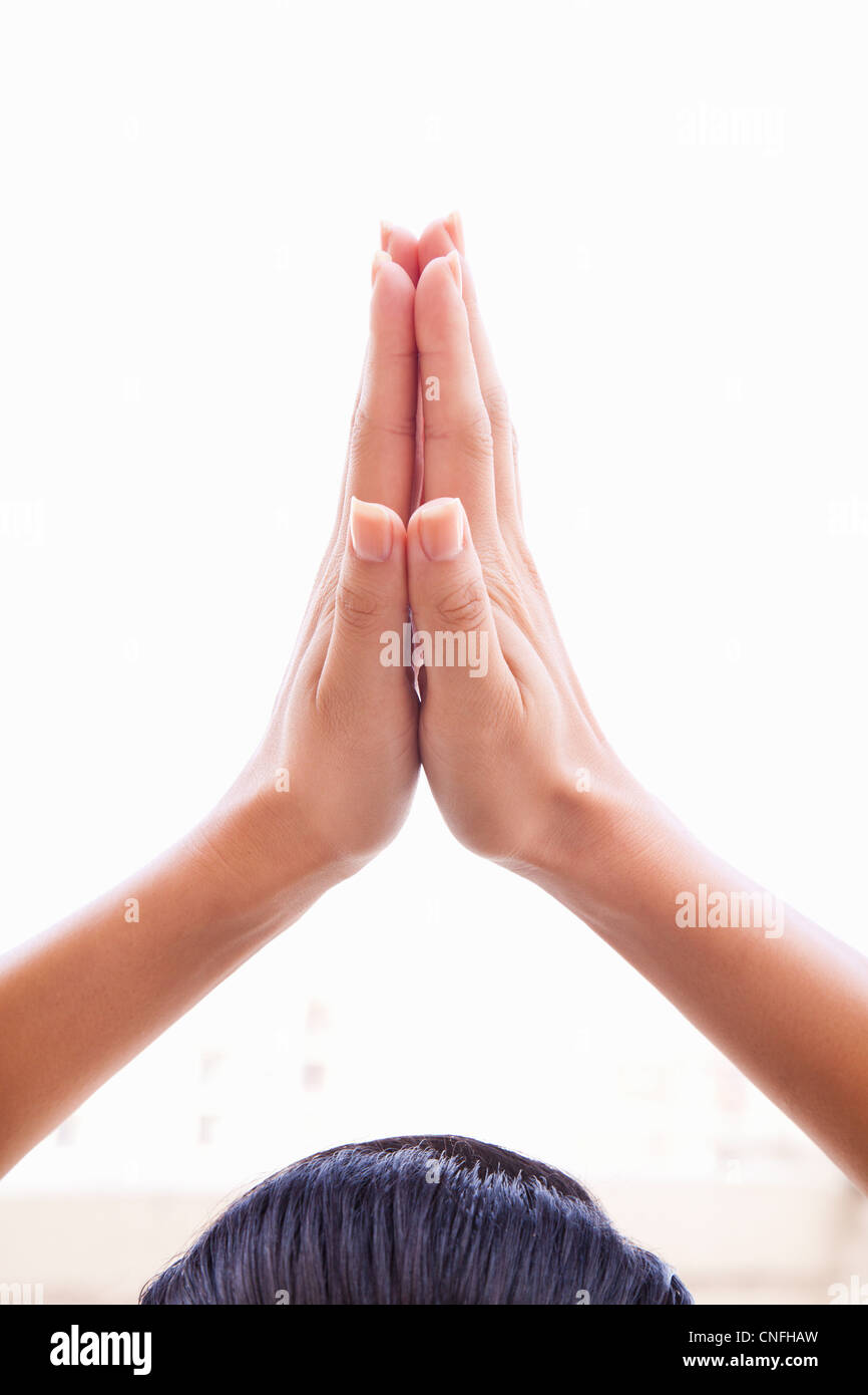 Close up of female hands together in prayer position Stock Photo - Alamy