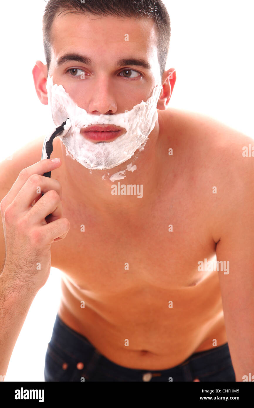 young man shaving Stock Photo - Alamy