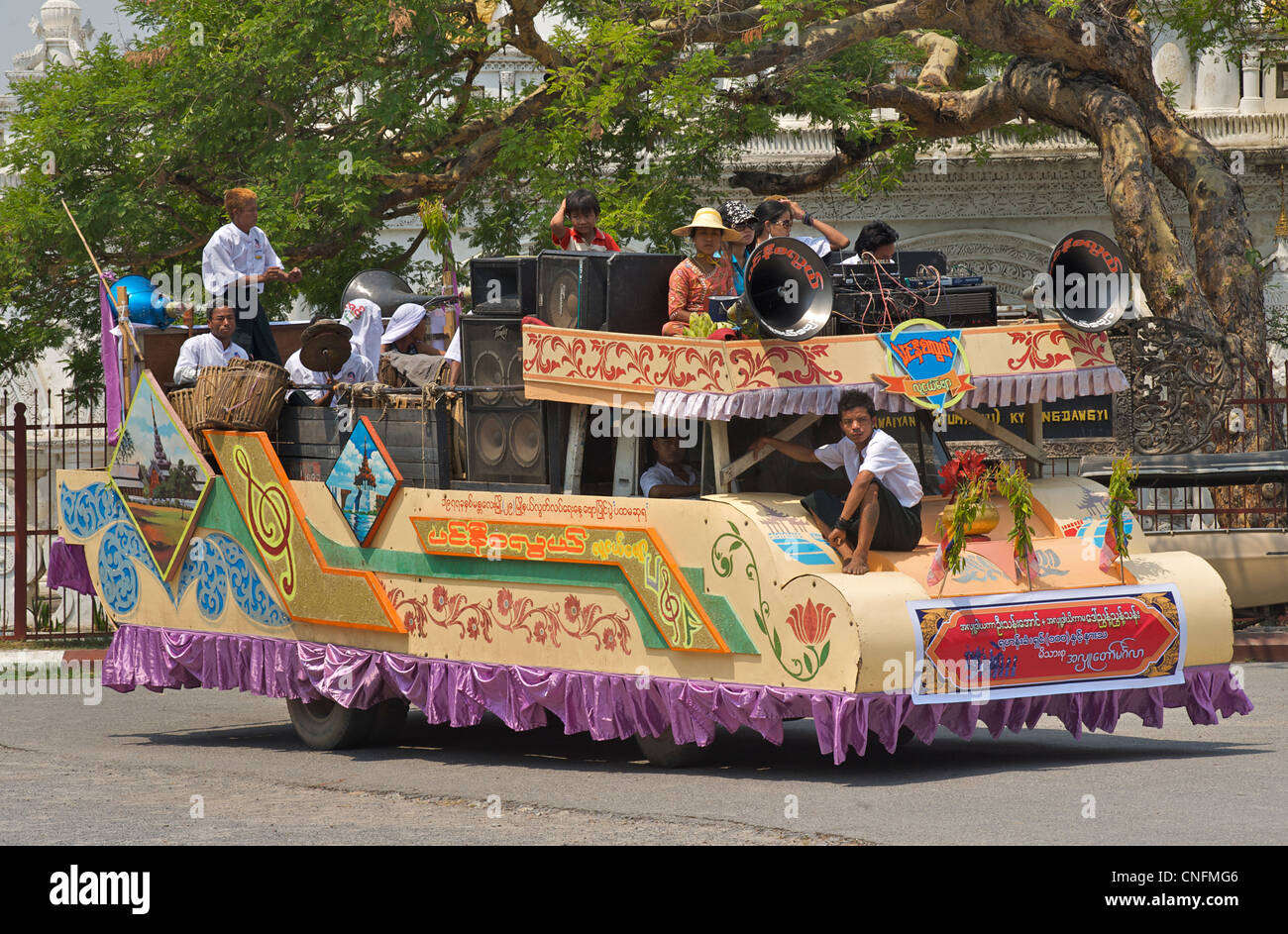 Burmese festival procession float. Dressed in traditional regalia ...