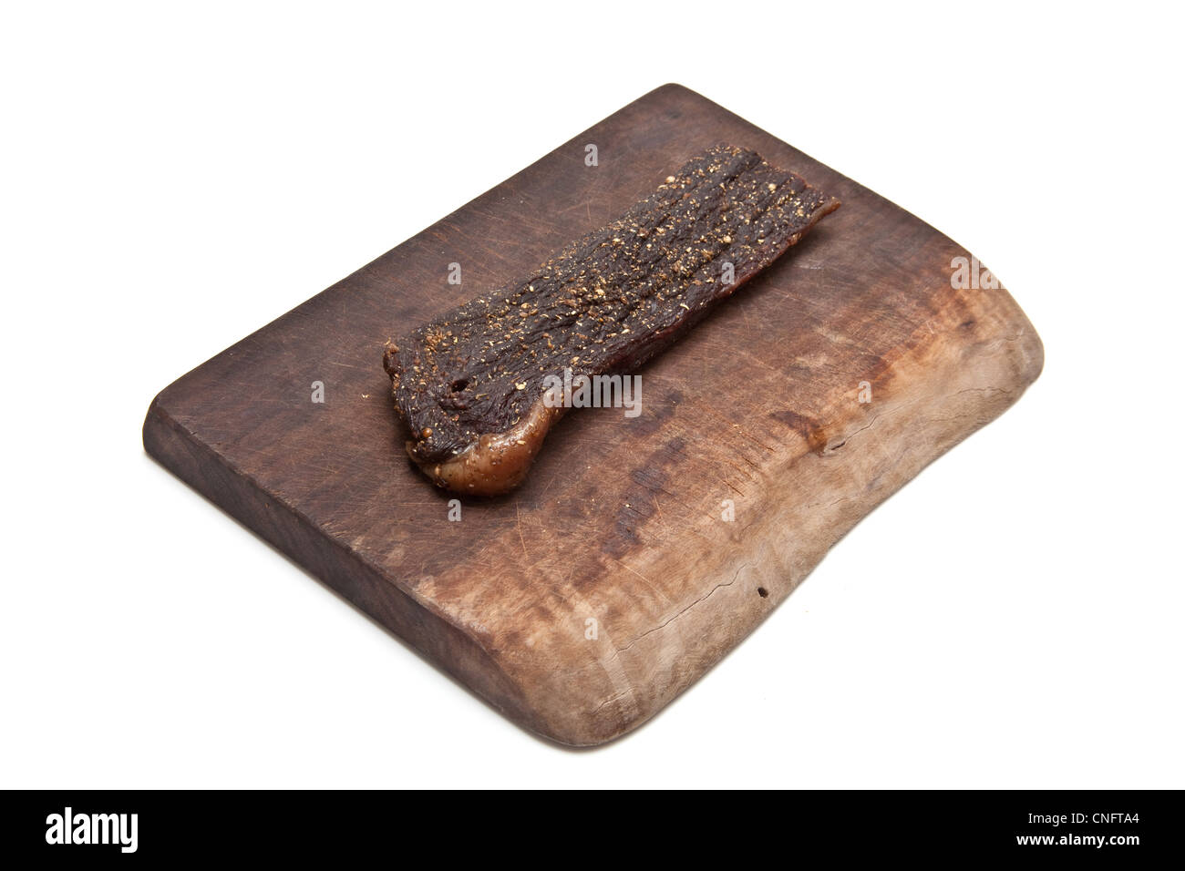 South African biltong (beef jerky) isolated on a white background Stock ...