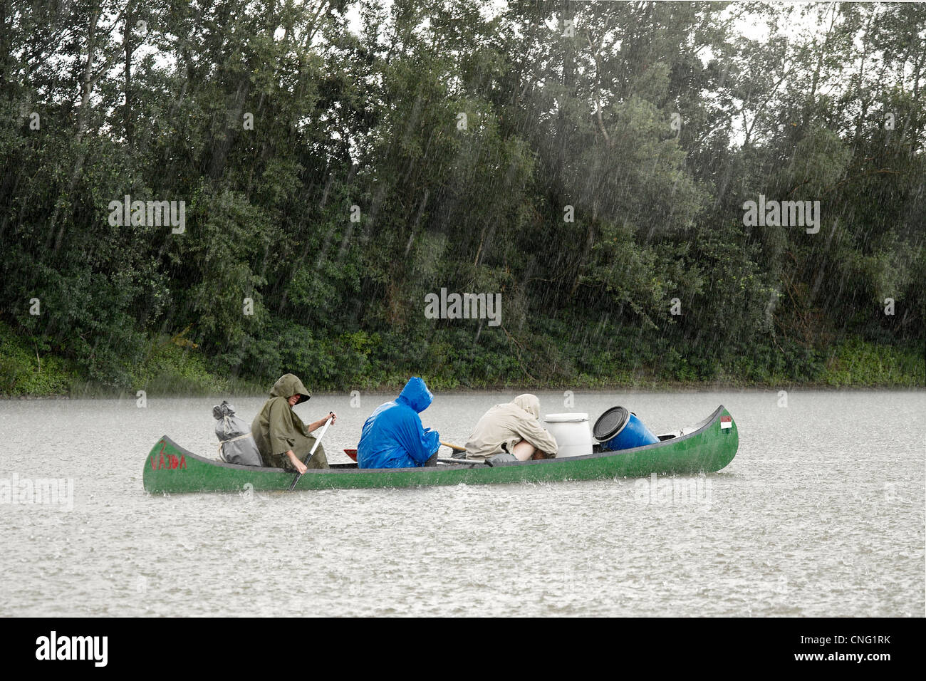 Canoing in the rain Stock Photo - Alamy