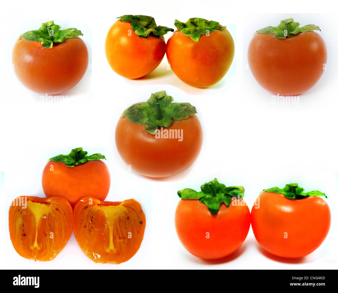 Ripe persimmons on white background Stock Photo - Alamy