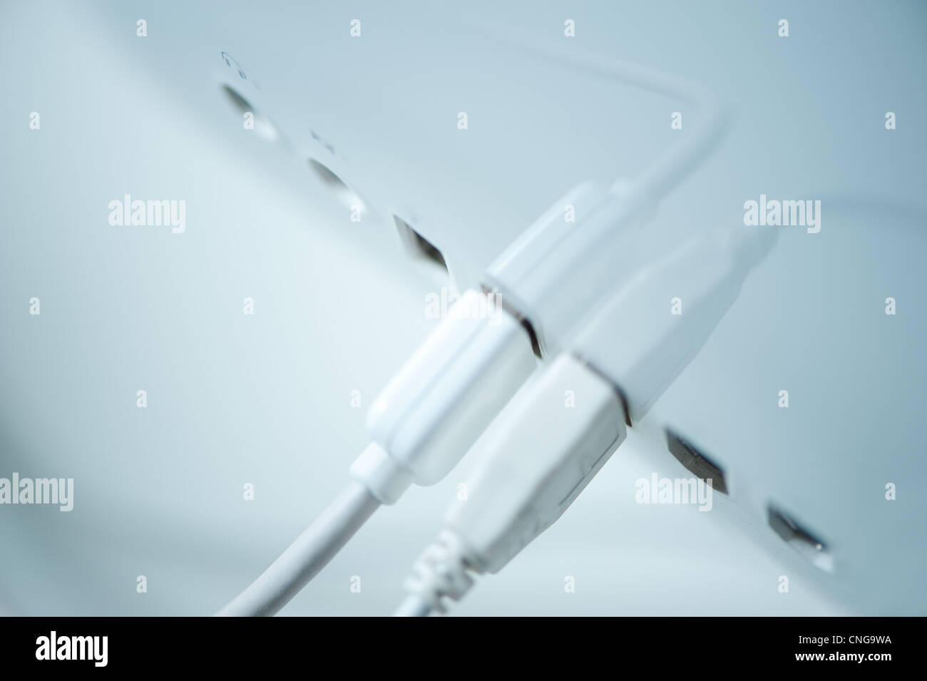 USB plugs in compter device with nice reflections Stock Photo - Alamy