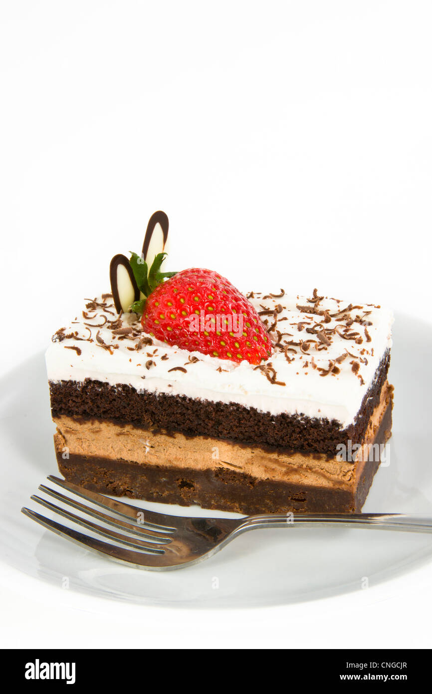 Piece of chocolate cake with strawberry decorate on top Stock Photo - Alamy