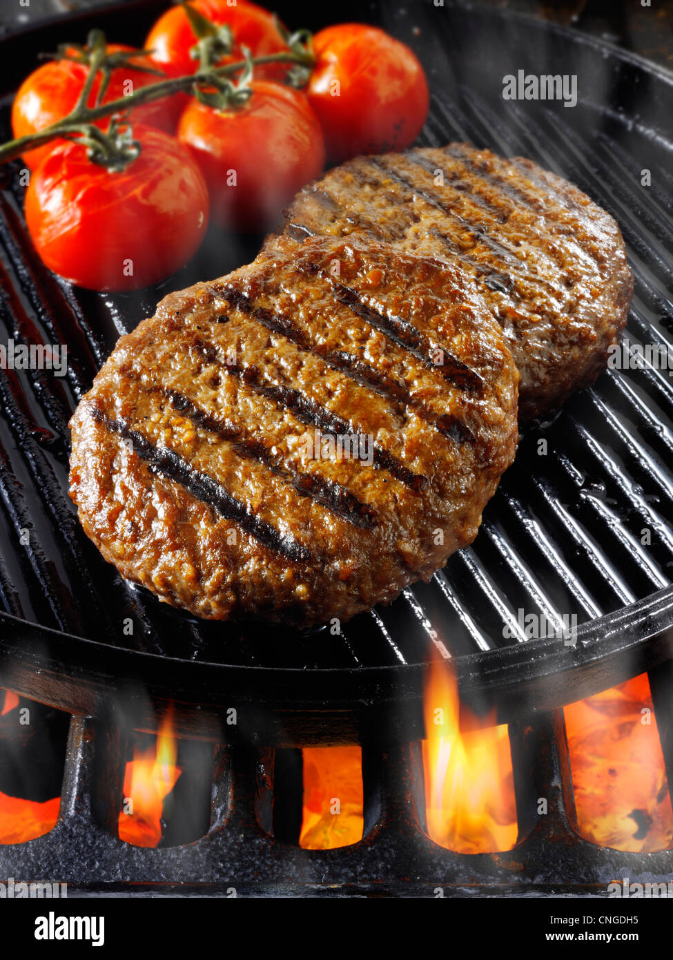 Beef burgers being cooked. Food photos, pictures & images Stock Photo ...