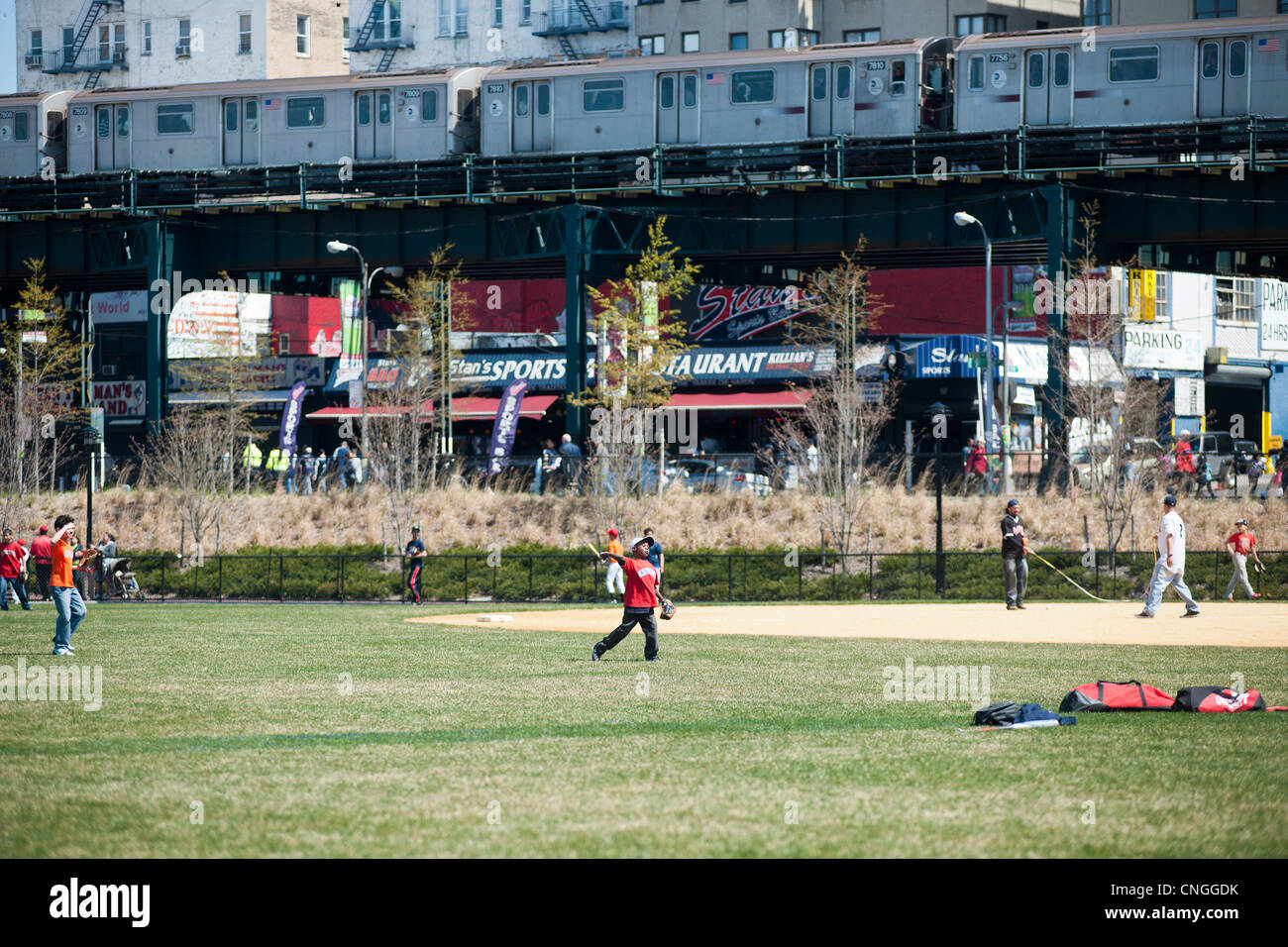 Little leaguers practice on the newly opened field at Macombs Dam Park ...